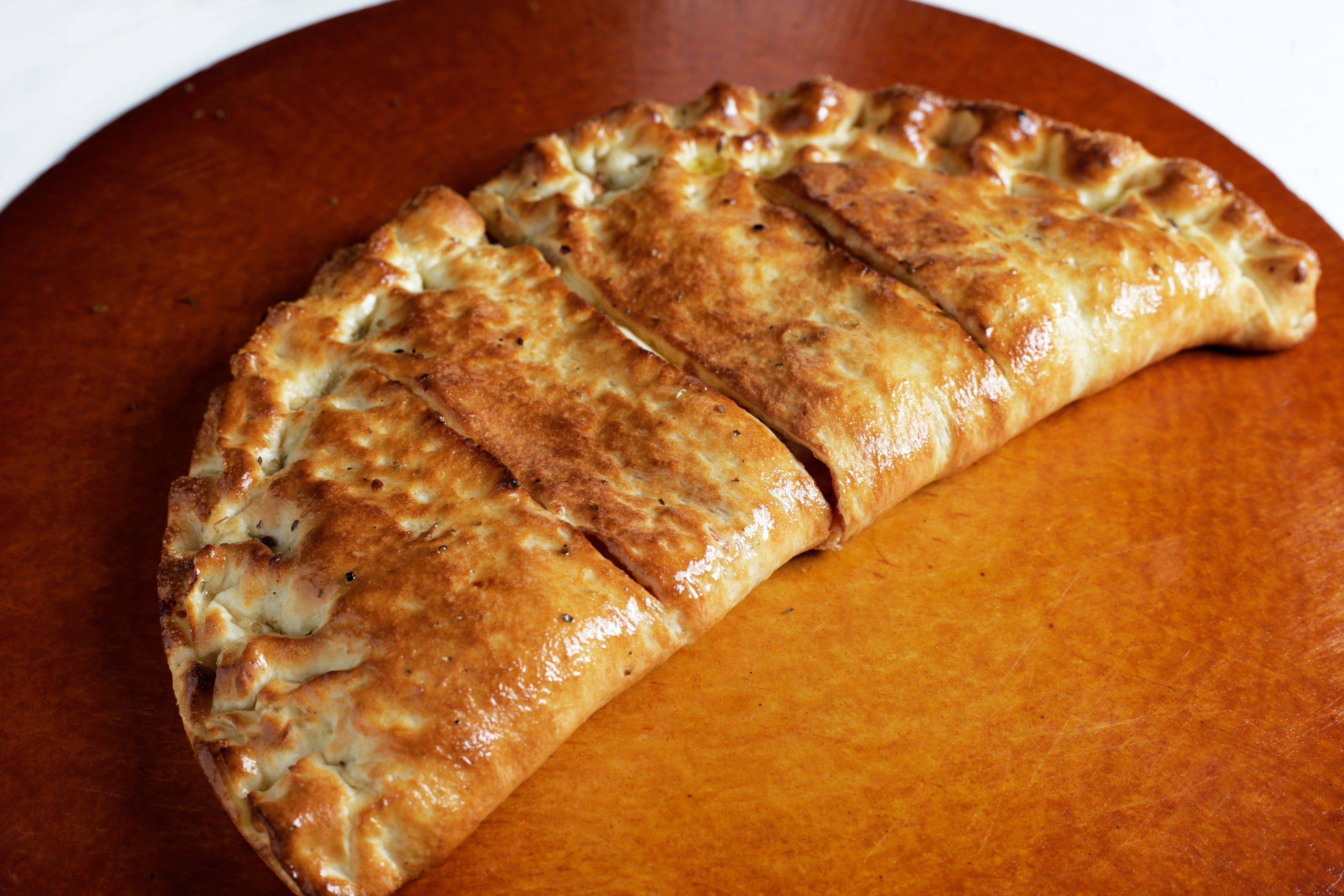 East Indian-Style Veggie Paneer Calzone | Can Am Pizza